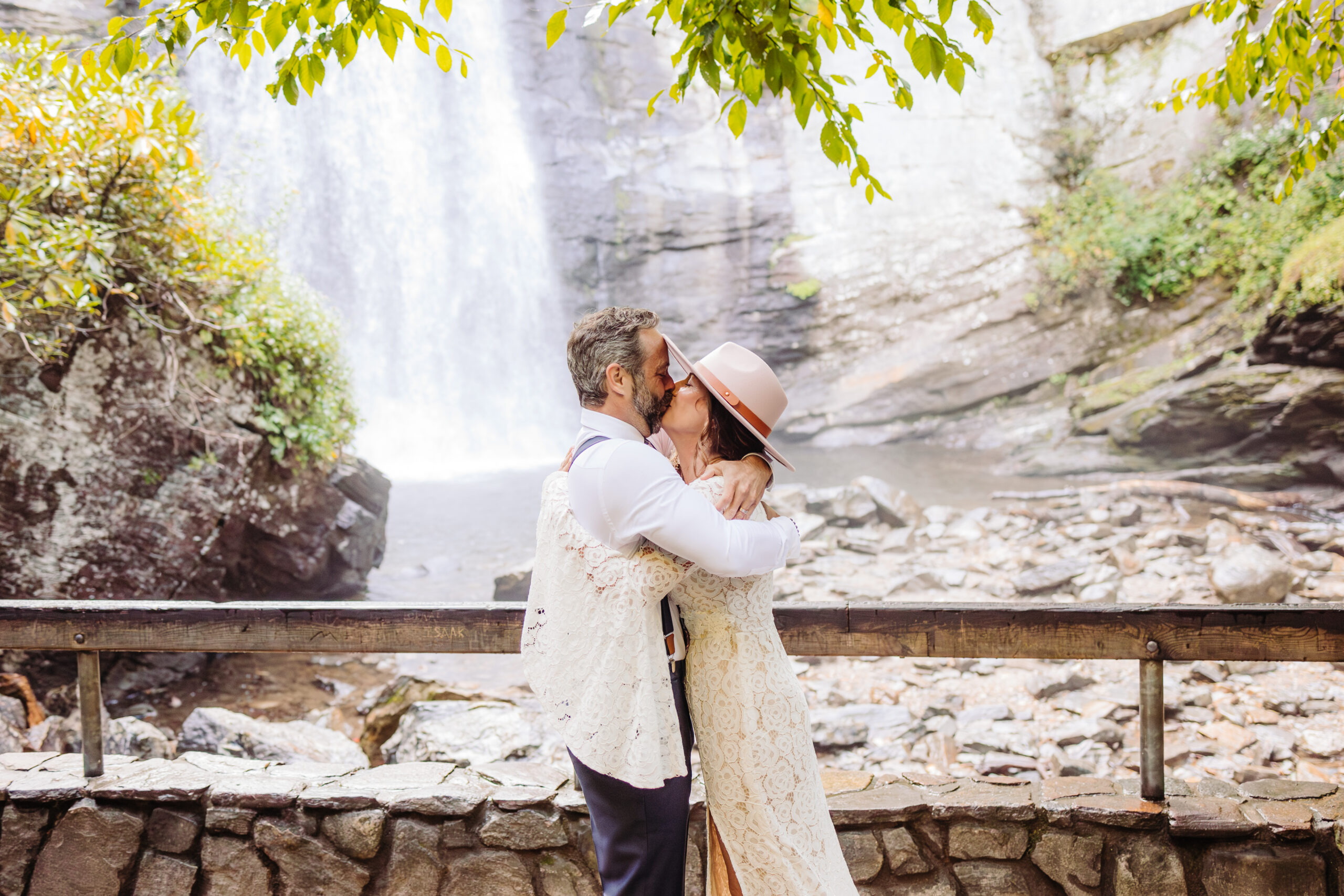 cople kiss Waterfall Ceremony Asheville NC Elopement. ~ Elope Outdoors